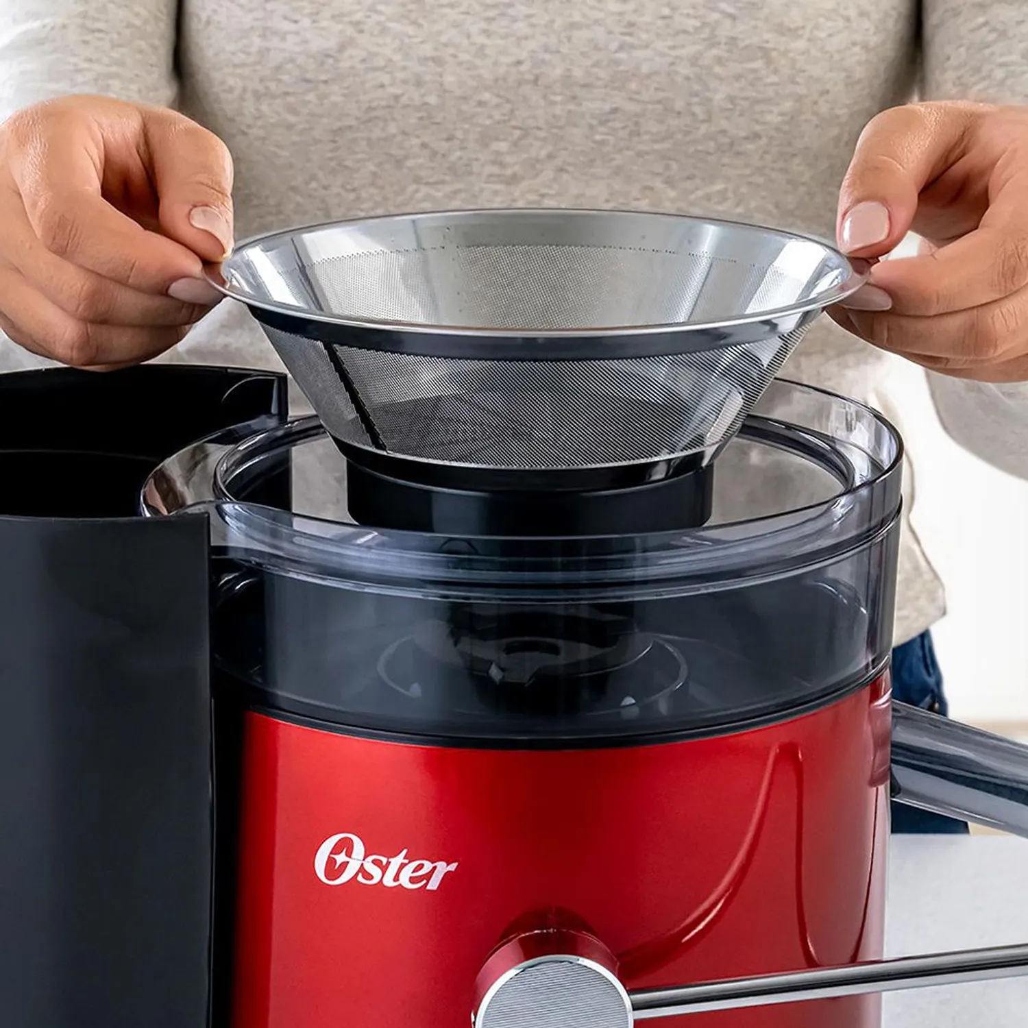 EXTRACTOR DE JUGOS 1.25 LT OSTER FPSTJE320R ROJO